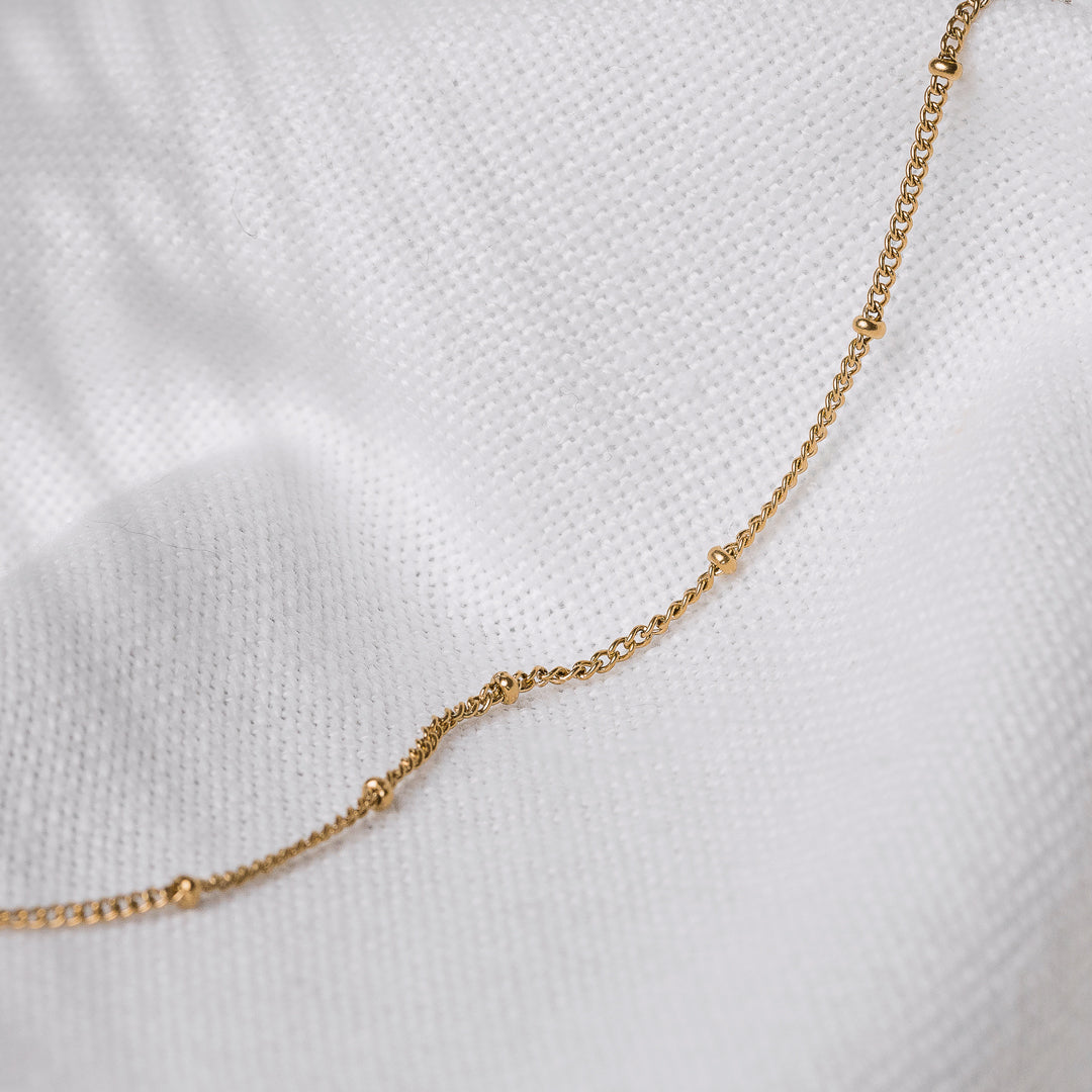 CHAÎNE DE CHEVILLE - LA MIGNONNE - OR – NEUF.VINGT.CINQ